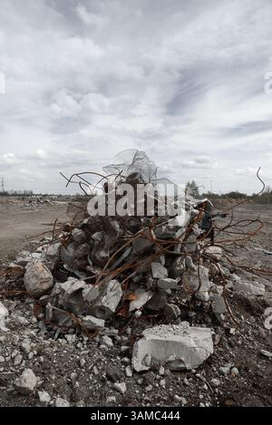 Pile of rubble with iron rods Stock Photo - Alamy