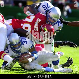 Kansas City Chiefs defensive ends Peter Woods (99) and Ashton Gillotte ...