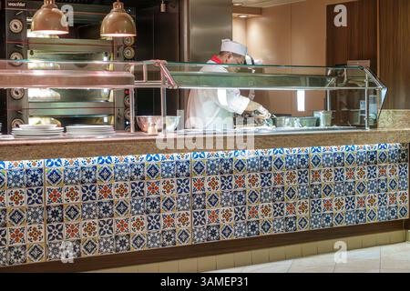 Chef cooking in galley on board a merchant ship Stock Photo - Alamy