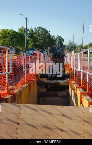 Urban Construction Worksite Featuring Excavation and Utility ...