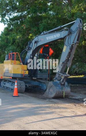 Urban Construction Worksite Featuring Excavation and Utility ...