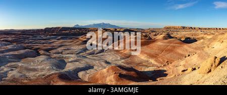 The colorful Bentonite Hills and the Henry Mountains outside of ...