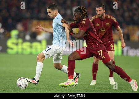 (L) Manu kone of Roma and (R) Reda Belahyane of Lazio seen in action ...