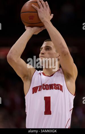 Iowa Hawkeyes head coach Ben McCollum reacts during the first half of ...