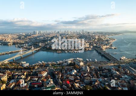 Beautiful Galata and Ataturk bridges with a cityscape and water with ...