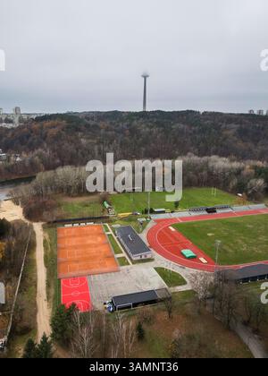 Aerial view of Vingio park and Neris river surrounded by forest and ...