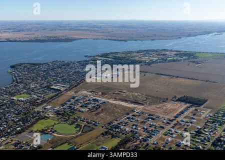 Aerial view of lake connewarre surrounded by residential homes and ...