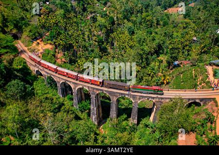 Aerial view of a train crossing the Nine Arch Bridge in Badulla, Sri ...
