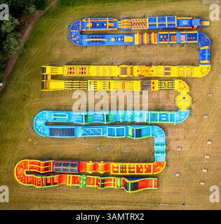 Inflatable obstacle course for fun. Inflatable structure in the park ...