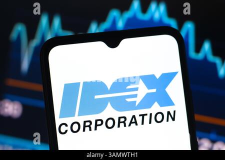 In this photo illustration, the IDEX Corporation logo is seen displayed ...