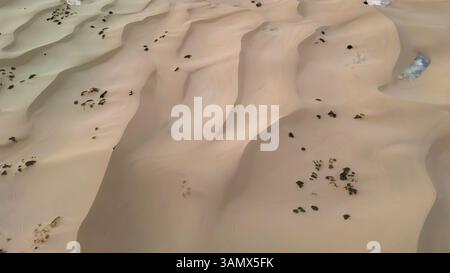 Aerial view of serene Samalayuca dunes at sunset with expansive sand ...