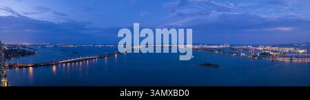 Aerial night view of Miami coastline. Twilight skyline above the Miami ...