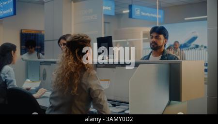 Multiethnic Passengers at Check-in Counter: Female Airline Agents ...