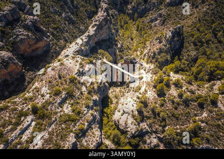 Aerial view of the Roman aqueduct of Pena Cortada surrounded by ...