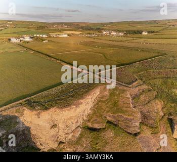Aerial view of Lanterdan Quarry at sunset, Trebarwith Strand, Tintagel ...