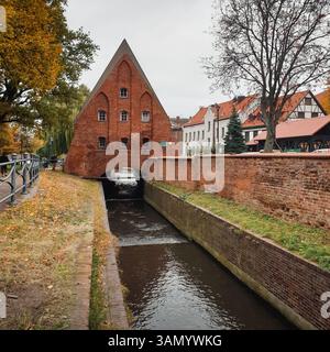 Ancient mill on the river with small wooden bridge Stock Photo - Alamy