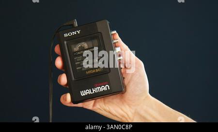 Hand holding vintage Walkman. Sony Walkman WM-B47 was a popular ...