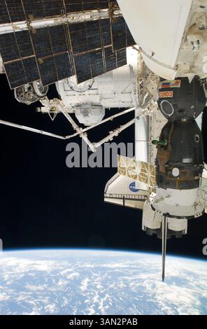 In the grasp of the station's robotic Canadarm2, Dextre (C), also known ...