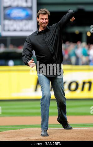 Former Seattle Mariners pitcher Randy Johnson wears catching gear to ...