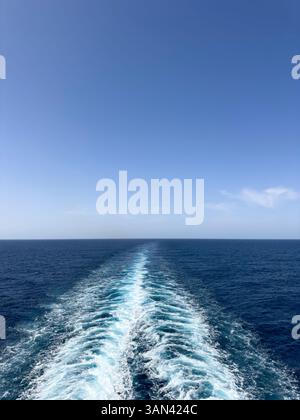 In the Atlantic Ocean, the wake from Cunard's RMS Queen Elizabeth's ...