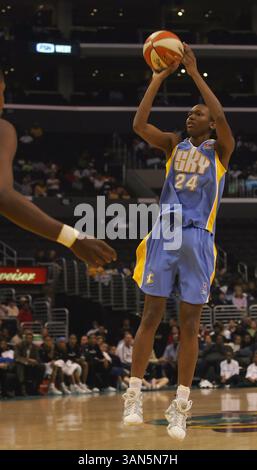 Los Angeles Sparks center Amanda Zahui B gestures after hitting a three ...