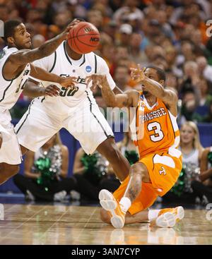 Michigan State's Derrick Nix, left, manuevers for a shot against ...