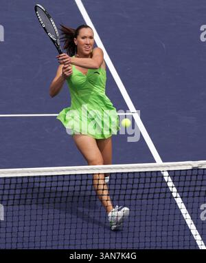 Jelena Jankovic of Serbia returns a shot to Samantha Crawford of the ...