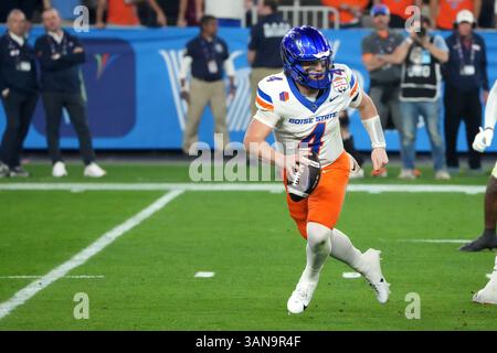Boise State quarterback Maddux Madsen (4) looks downfield against UNLV ...