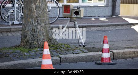 Radar measuring device device on a tripod at the edge of the pavement ...