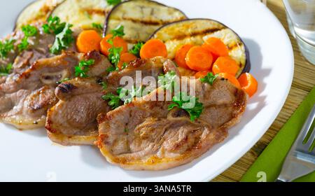 Mutton loin chops grilled with eggplant Stock Photo - Alamy