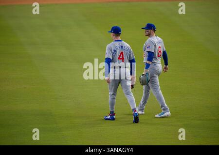 Chicago Cubs' Kyle Tucker (30), right, high-fives Ian Hapy after Tucker ...