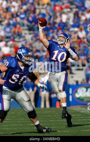 Kansas wide receiver Kerry Meier (10) dives for a pass with coverage ...