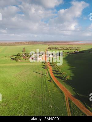 Aerial view of tranquil Lynton Station surrounded by vibrant hills and ...