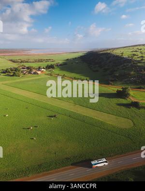 Aerial view of tranquil Lynton Station surrounded by vibrant hills and ...
