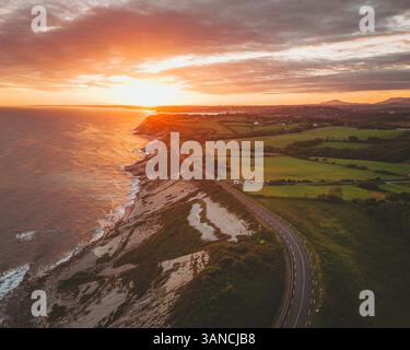Aerial View of the Corniche Basque road at sunrise, French Basque ...