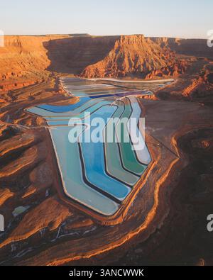 Aerial view of colorful Potash Ponds at sunrise, near Moab, Utah ...