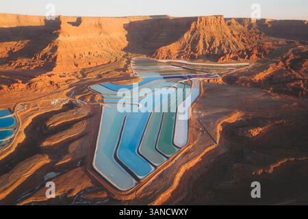 Aerial view of colorful Potash Ponds at sunrise, near Moab, Utah ...