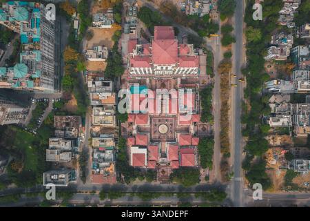 Aerial view of Gurugram district with buildings and an empty suspended ...