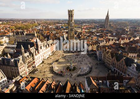 An aerial view of cityscape Bruges surrounded by buildings Stock Photo ...