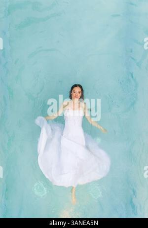 Beautiful wedding by the ocean on a sunny day. Arch cleaned with ...