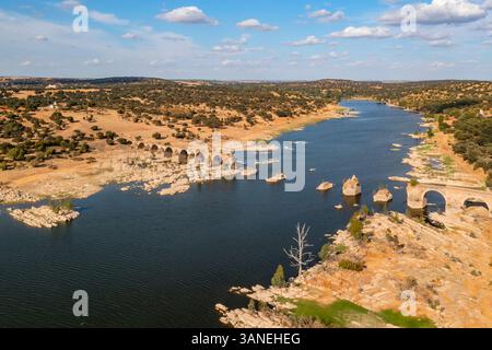 Aerial view of Puente Ayuda, a collapsed stone bridge crossing the ...