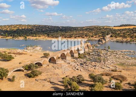 Aerial view of Puente Ayuda, a collapsed stone bridge crossing the ...
