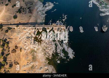 Aerial view of Puente Ayuda, a collapsed stone bridge crossing the ...