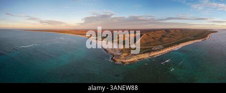 Aerial view of Vlamingh Head Lighthouse and Dunes Beach with blue ocean ...