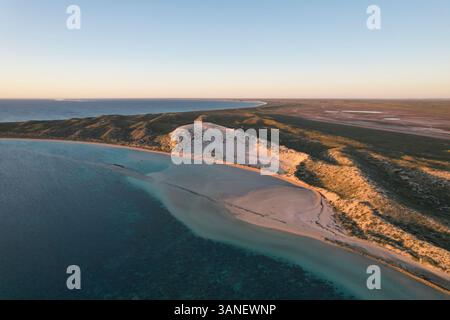 Aerial view of beautiful Bills Bay with beach goers and Ningaloo Reef ...