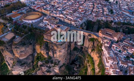 Ronda aerial view at sunrise with old buildings in Spain Stock Photo ...
