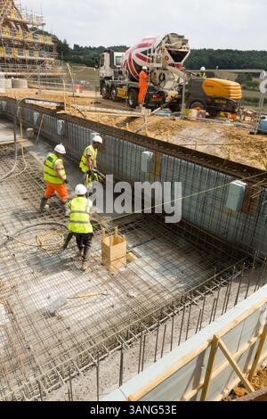 Concrete spraying in building constructiom Stock Photo - Alamy