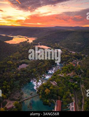 A picturesque river view at sunrise, surrounded by lush greenery ...