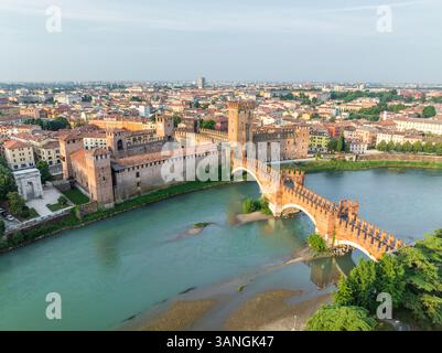 An aerial view of Ponte Scaligero bridge in Italy on blue sky ...