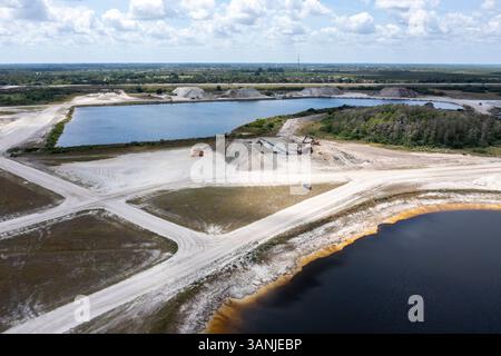 Aerial view of Sunshine Mine with surrounding lake and industrial ...